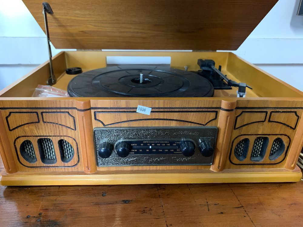 Reproduction record player and radio